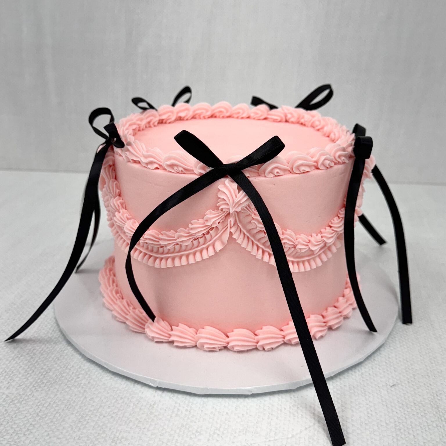 A Coquette Cake That Steals the Show - All Things Cake